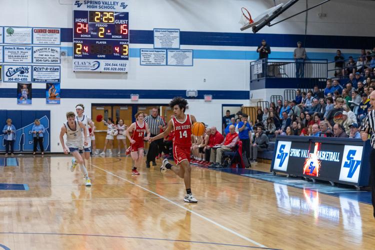 Prep boys basketball region co-final: Timberwolves rough up Big Reds ...