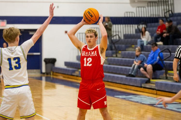 Prep boys basketball: Irish stave off Wahama to head back to state ...