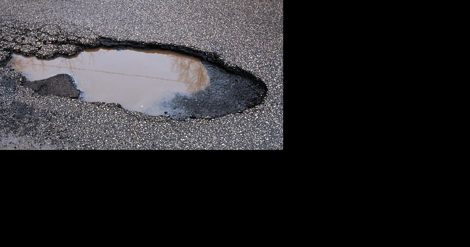 Pothole on US 60 bridge closes left side of bridge | News | herald ...