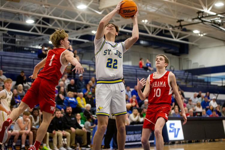 Prep boys basketball: Irish stave off Wahama to head back to state ...