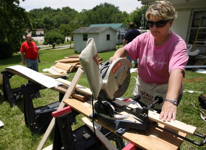 Volunteers help fix up houses | News | herald-dispatch.com