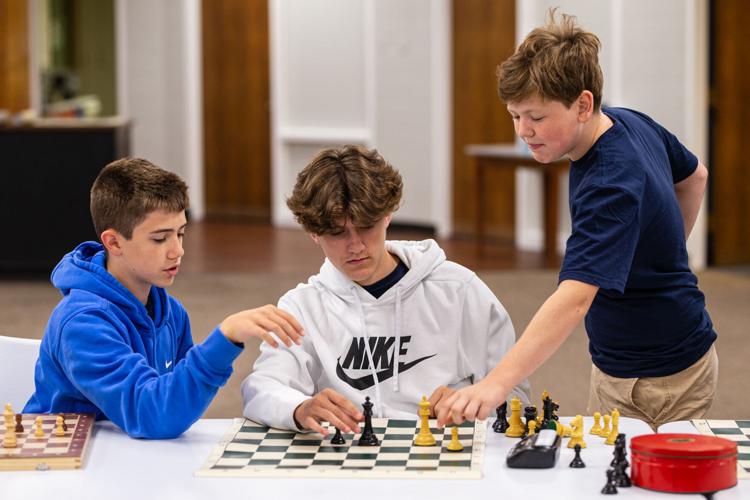 Chess campers learn strategic and tactical skills from grandmaster ...