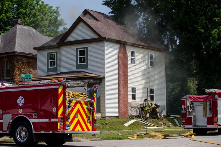 Two house fires burn simultaneously in Huntington | News | herald ...