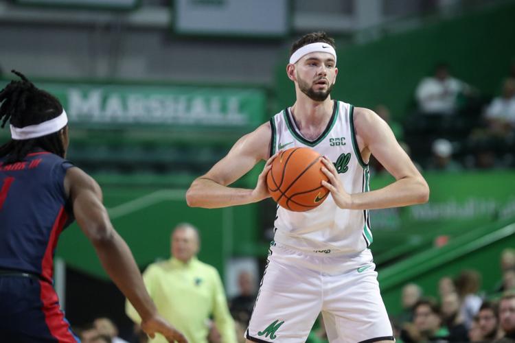 Photos: Marshall men's basketball team vs. Duquesne | Multimedia ...