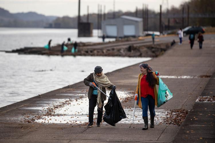 Volunteers honor late professor with river cleanup | News | herald ...