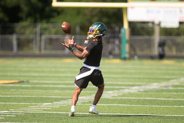 Photos: HHS football team conducts first day of summer practice ...