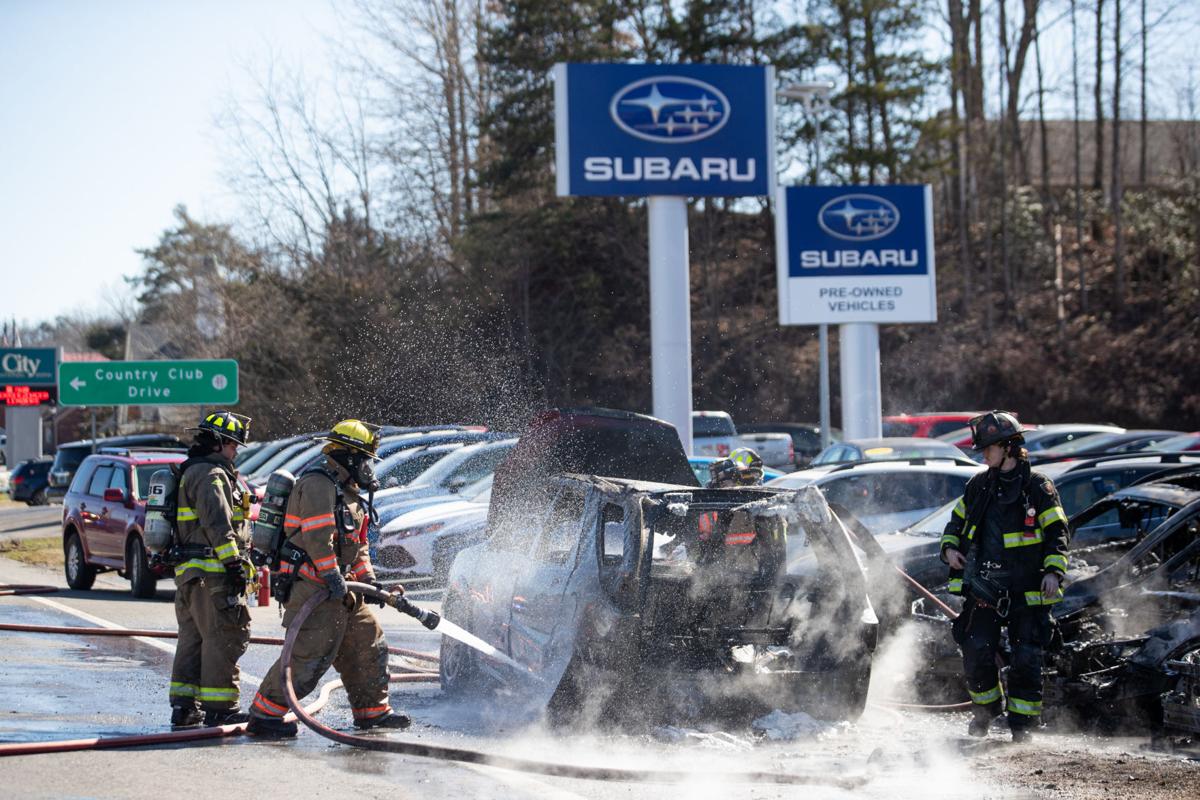 Photos: Firefighters battle vehicle fire at River City Subaru ...