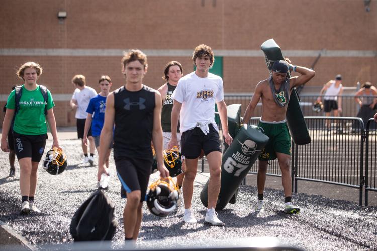 Photos: HHS football team conducts first day of summer practice ...
