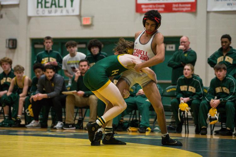 Photos: Cabell Midland wrestling team defeats Huntington High ...