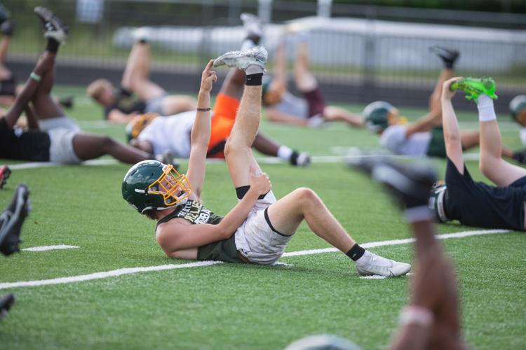 Photos: HHS football team conducts first day of summer practice ...