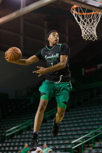 Dunking freshman Taevion Kinsey is a high flier for Thundering Herd ...