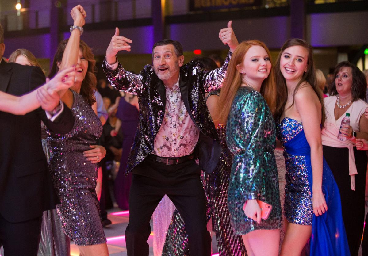 Disco club theme draws record crowd for fundraiser | News | herald ...