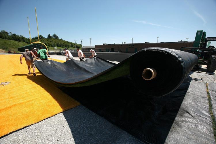 Gallery: HHS Football Field's New Turf | Photo Galleries | herald ...