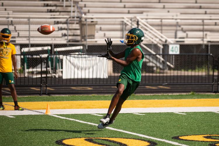 Photos: HHS football team conducts first day of summer practice ...