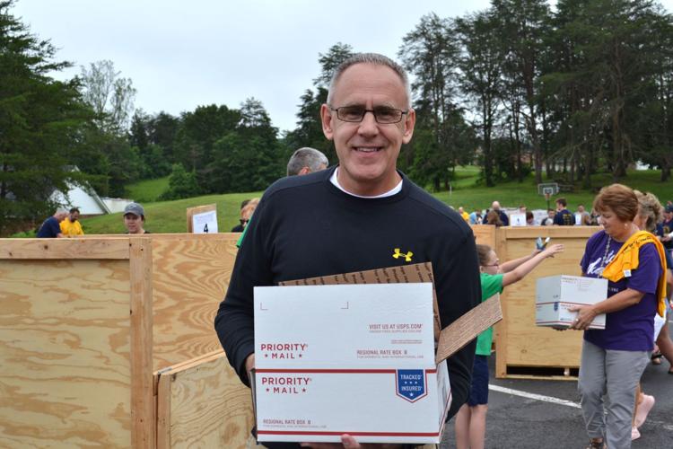 Church hosts Backpack Buddy packing day | Putnam News | herald-dispatch.com