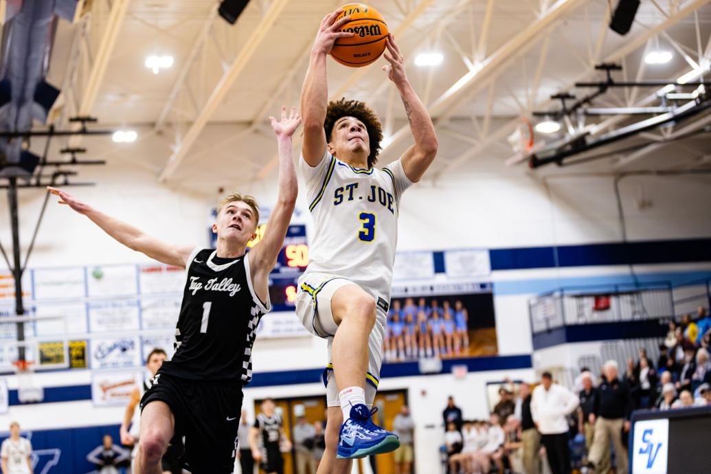 Photos: Boy’s basketball, Huntington St. Joe defeats Tug Valley in OT ...