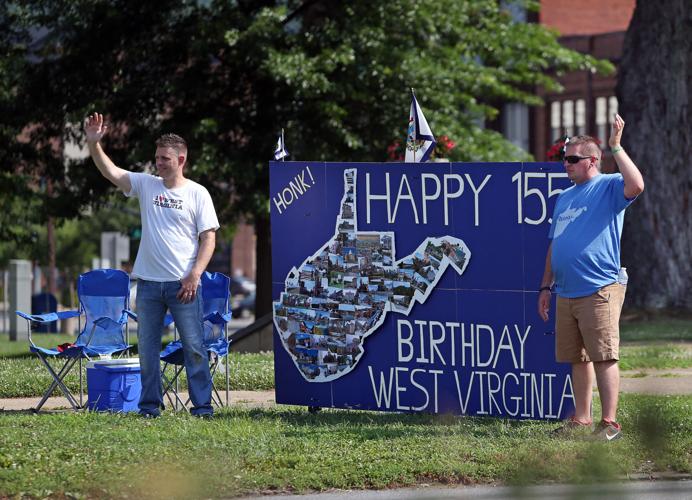 Resident celebrates WV Day with giant birthday card in Huntington ...