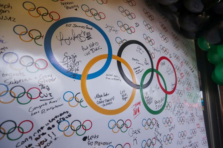 Photos: Watch party for Olympian McKenzie Long's 200-meter final run ...