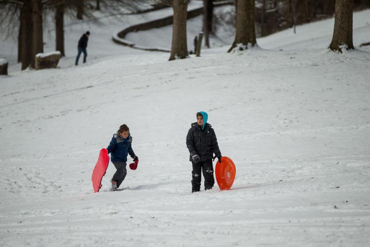 Photos: People spend the afternoon out in the snow at Ritter Park ...