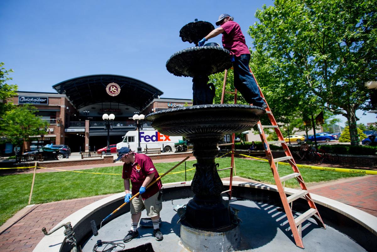 Painting Pullman: Workers touch up fountain at Pullman Square | News ...