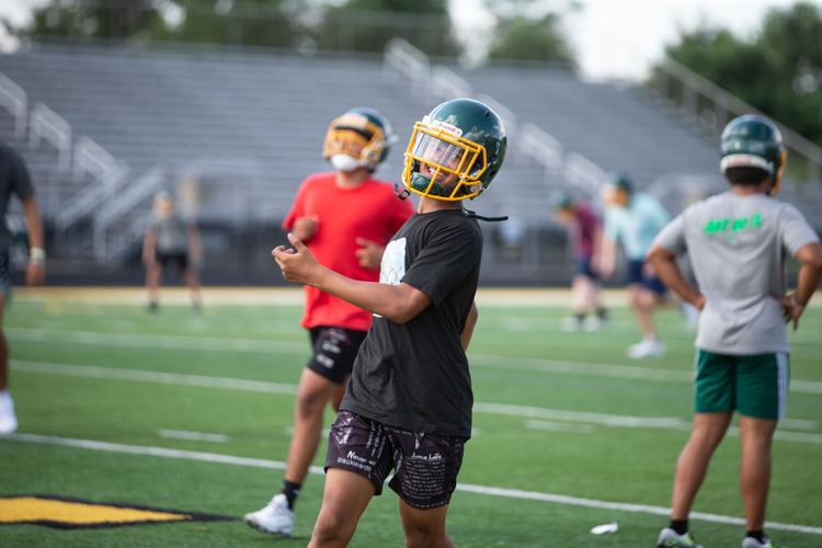 Photos: HHS football team conducts first day of summer practice ...