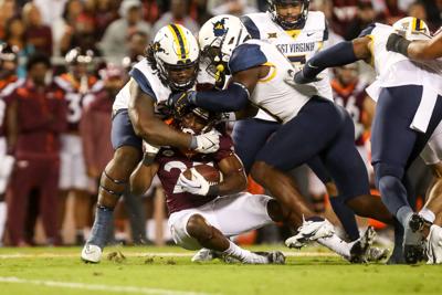 WVU football: WVU rediscovered its run defense against Virginia Tech ...