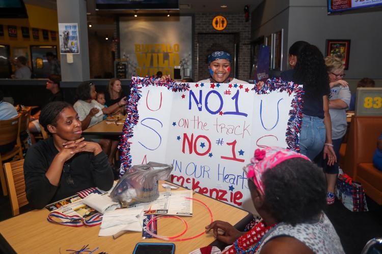 Photos: Watch party for Olympian McKenzie Long's 200-meter final run ...