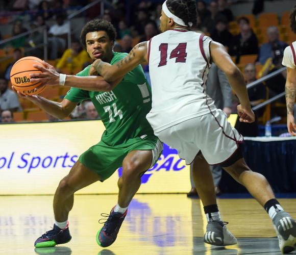 Class AA boys basketball title game: Catholic digs in to claim crown ...