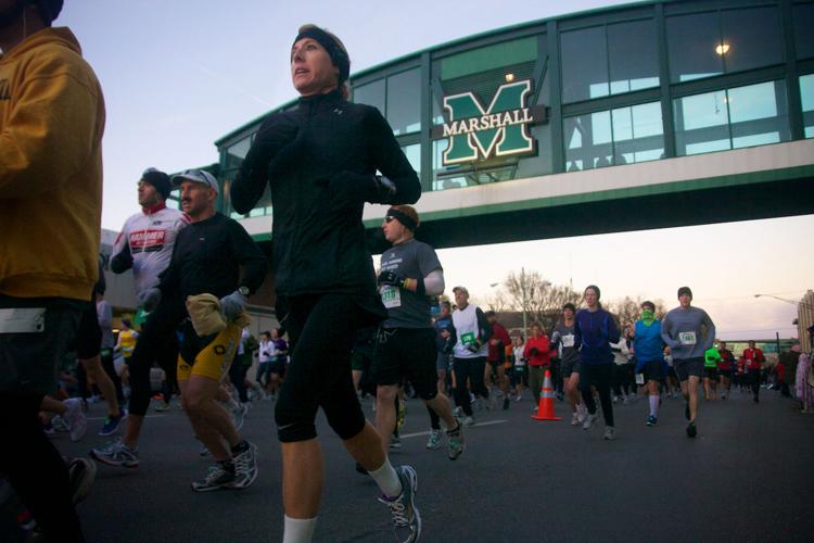 Thousands endure chilly air to run Marshall Marathon | Sports | herald ...