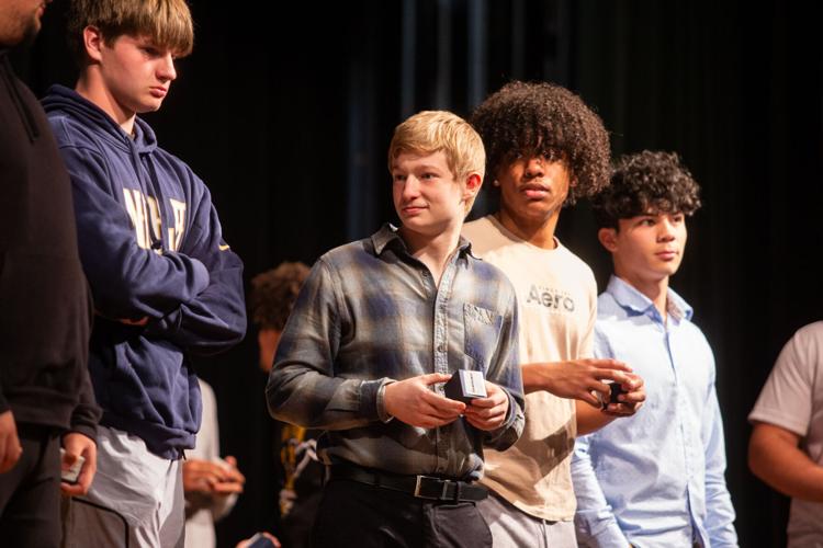Photos: HHS football team members receive championship rings ...