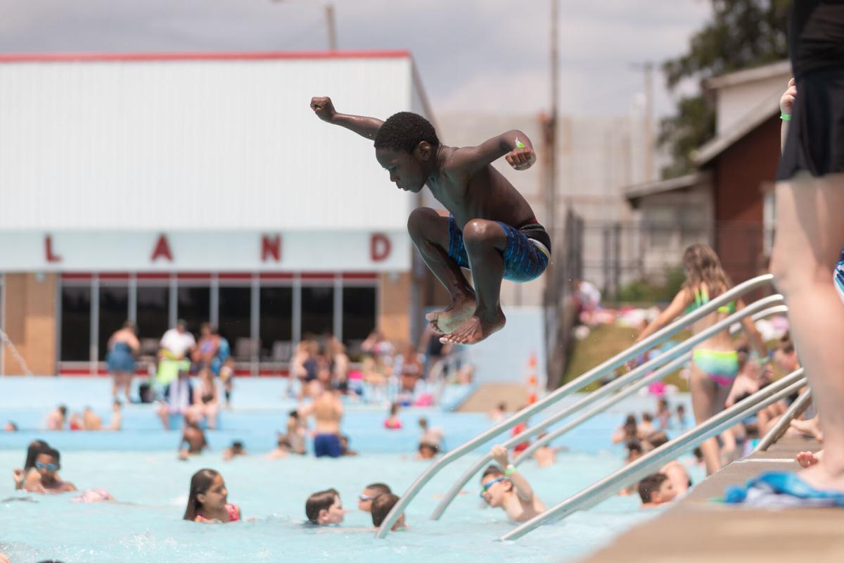 Photos: People cool off at Dreamland Pool | Multimedia | herald ...