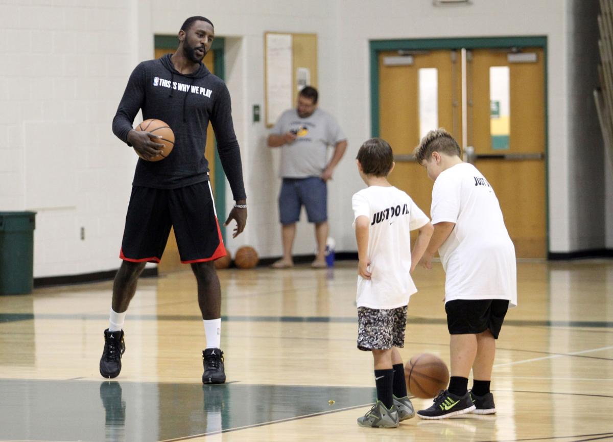 Kids learn from a pro at Patrick Patterson Camp | Youth Sports | herald ...