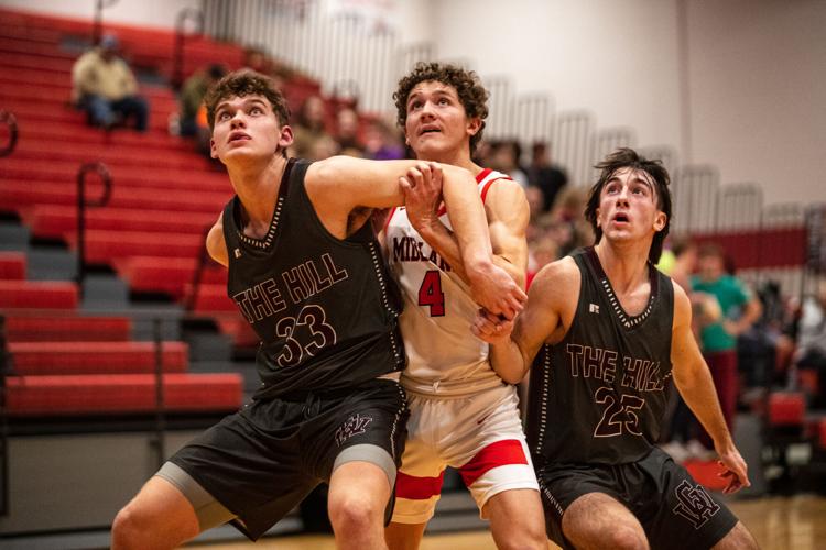 Photos: Cabell Midland vs. George Washington, boys basketball ...