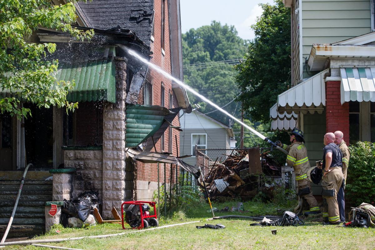 Two house fires burn simultaneously in Huntington | News | herald ...