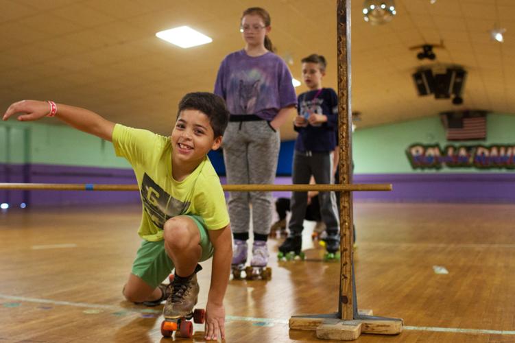 Photos: Roller-skaters meet Santa and Mrs. Claus at Roll-A-Rama | Photo ...