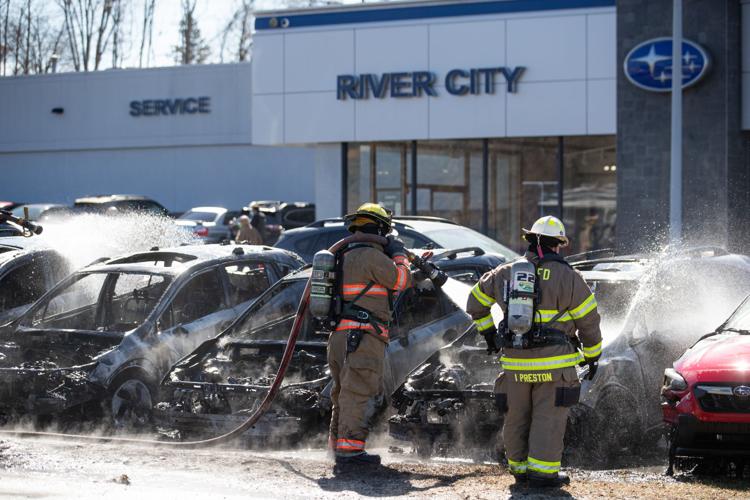 Photos: Firefighters battle vehicle fire at River City Subaru ...