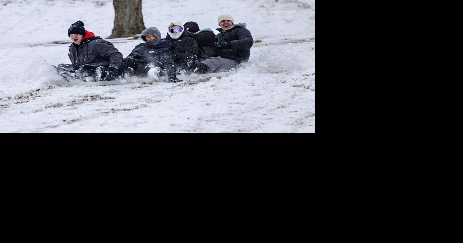 Sleds, shovels and snowmen: Huntington residents brave the cold for ...