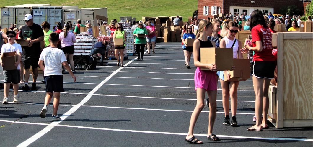 Volunteers pack summer food boxes for children | Putnam News | herald ...