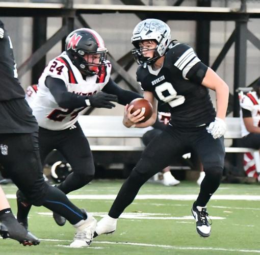 Prep football: Nitro breaks loose in second half to knock out North ...