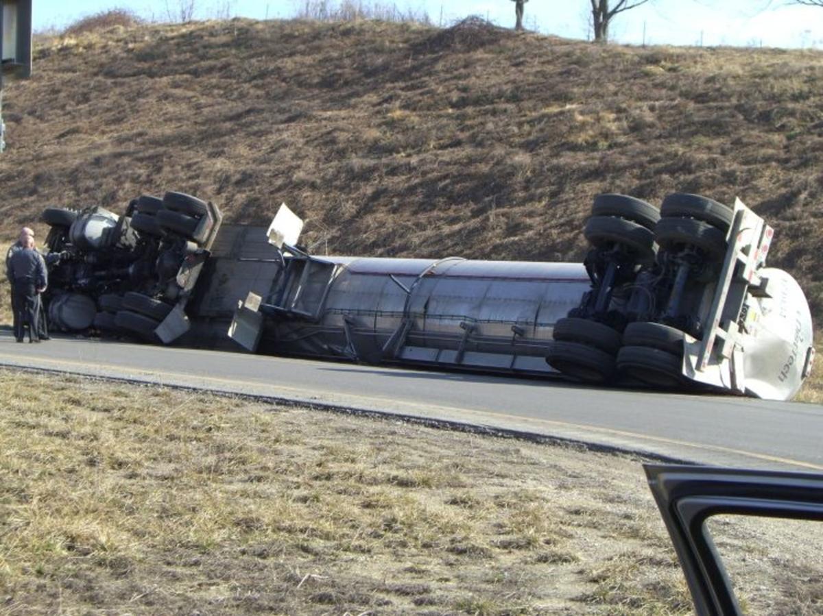 Overturned tanker causes extended road closure | News | herald-dispatch.com