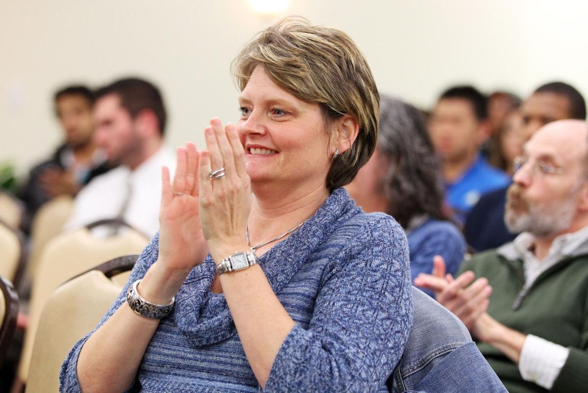 Former Hillary Clinton campaign manager urges women to take on ...