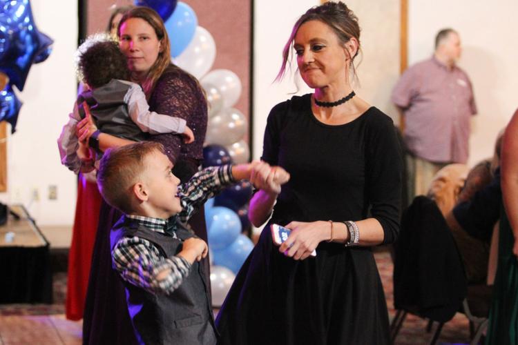 Photos: Mom & Son Prom at Pullman Plaza Hotel | Multimedia | herald ...