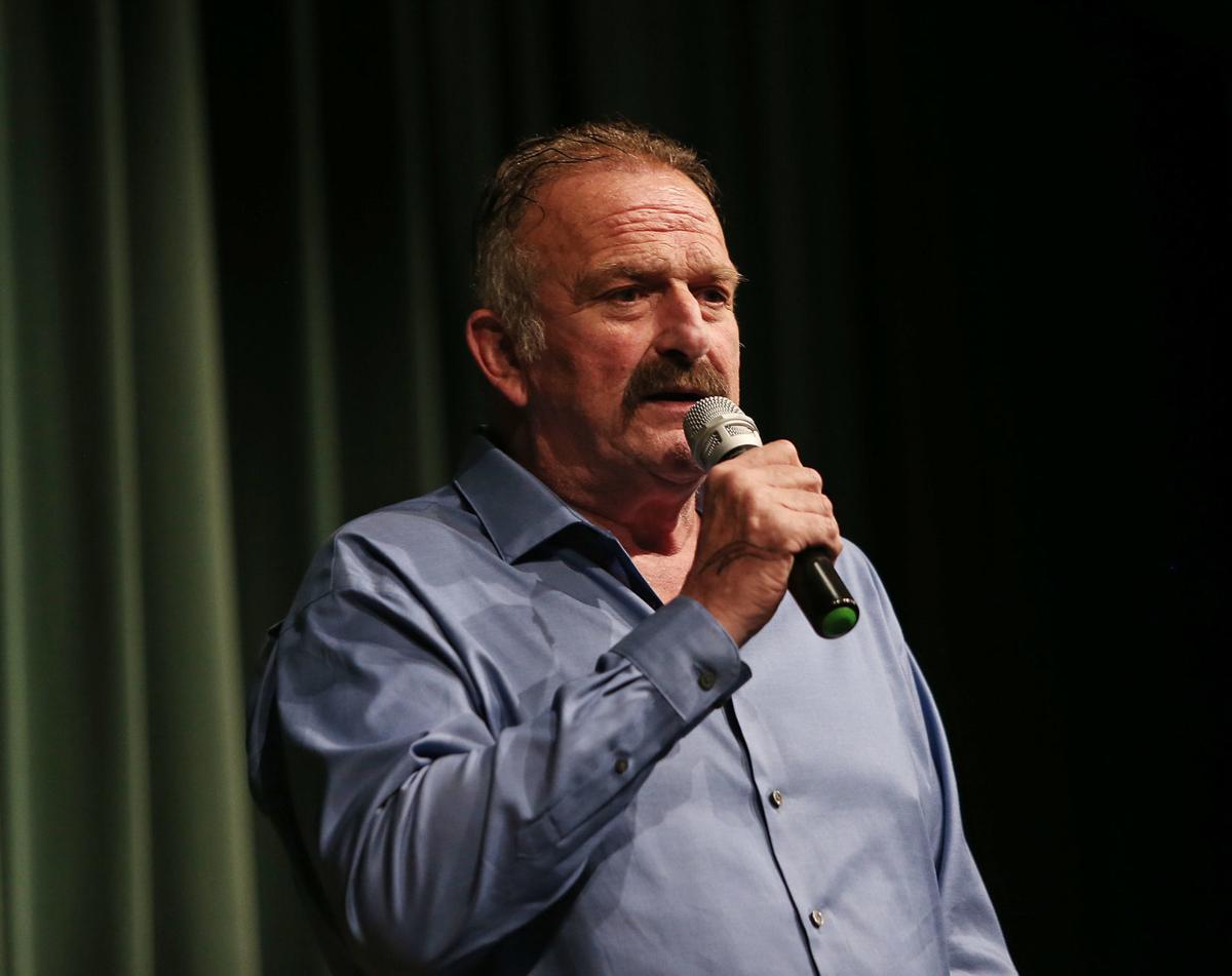 Photos: Wrestler Jake “The Snake” Roberts visits Huntington High ...