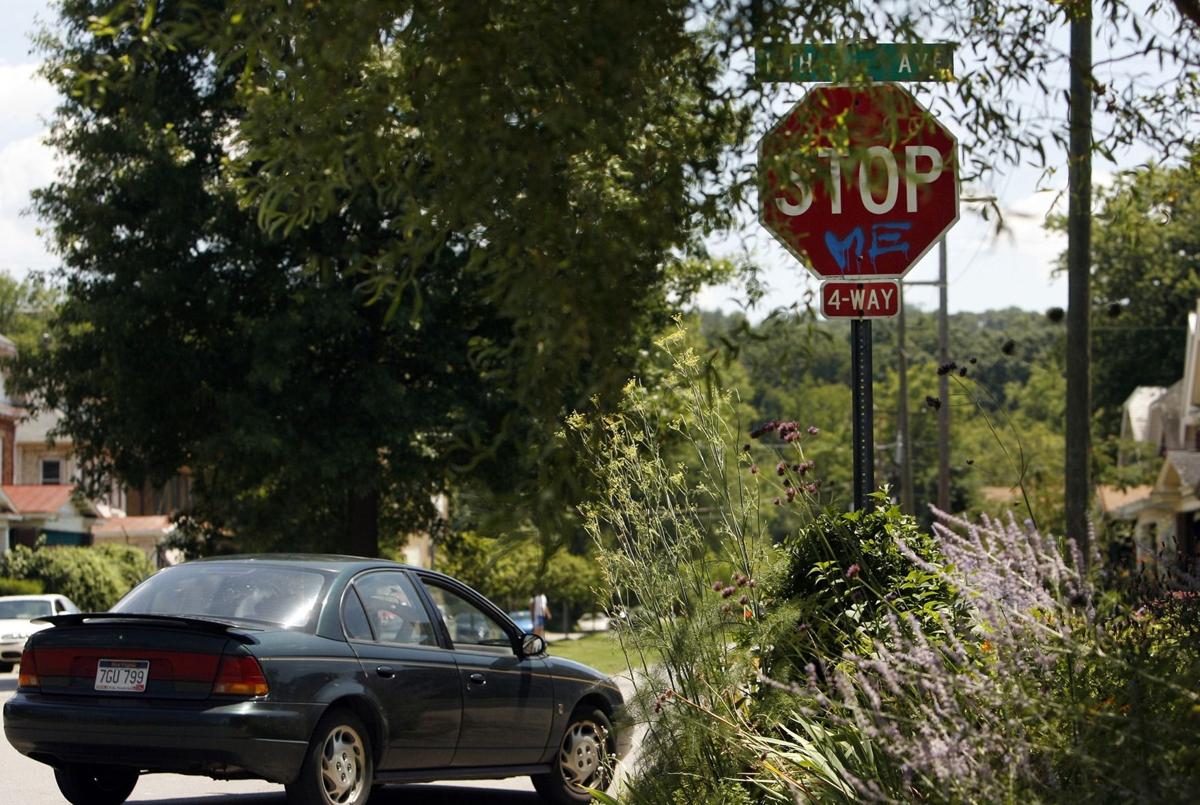 Trees and shrubs obstructing stop signs | News | herald-dispatch.com