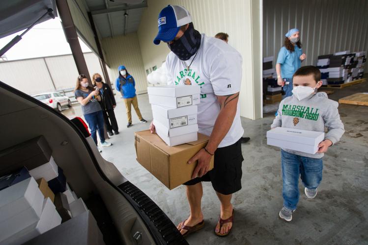 Photos: Former Herd, NFL player Legursky lends hand to United Way ...