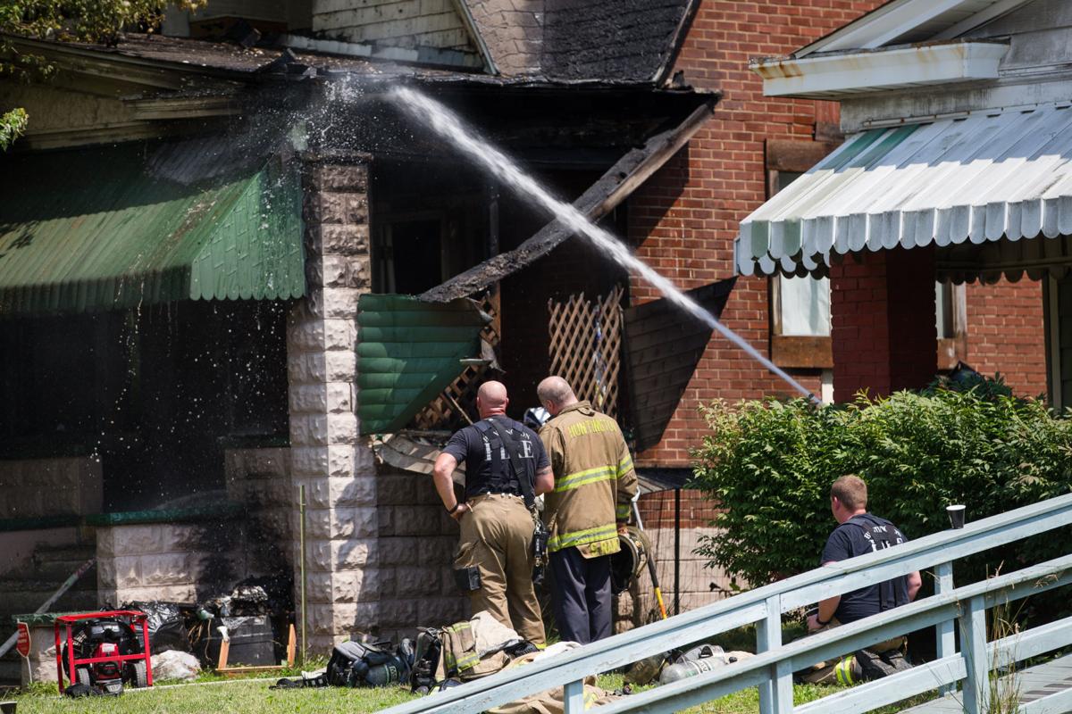 Two house fires burn simultaneously in Huntington | News | herald ...