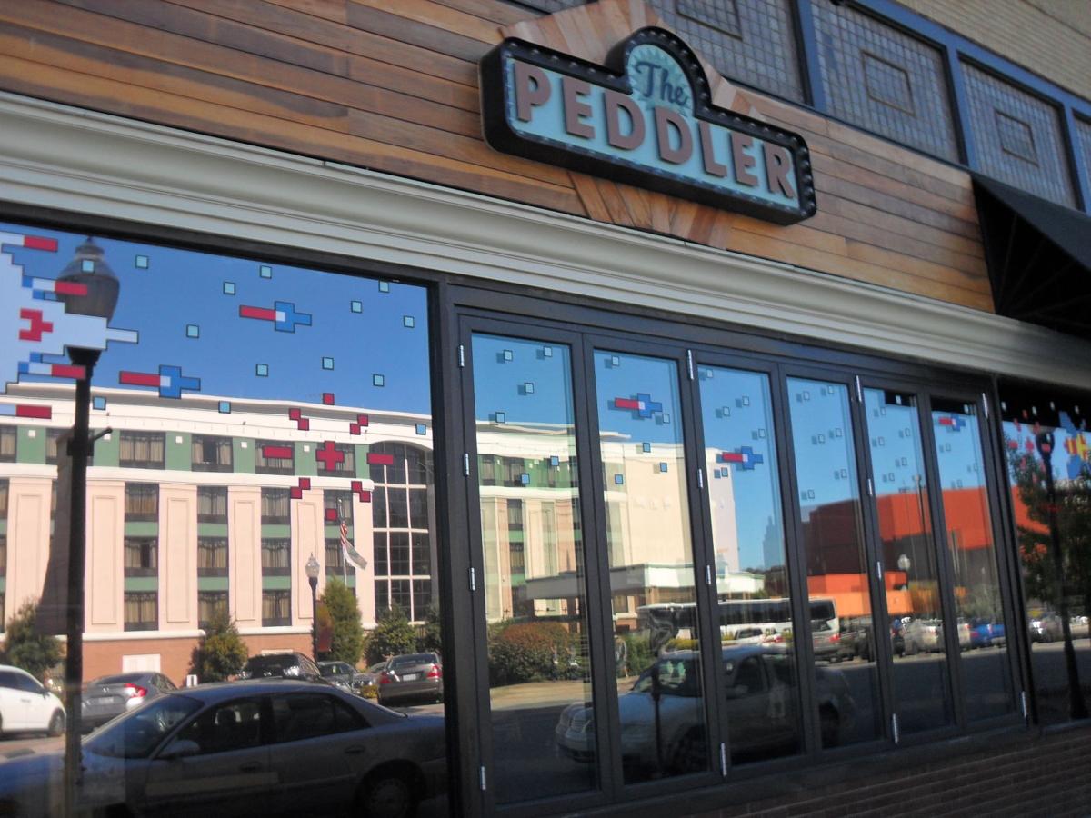 The Peddler returns with burgers, an arcade bar and brews | Dining ...