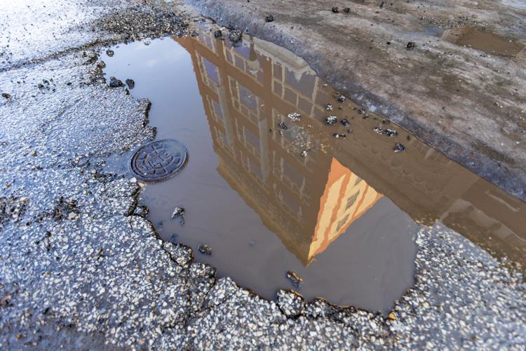 Local officials start cold patch maintenance on potholes formed by ...