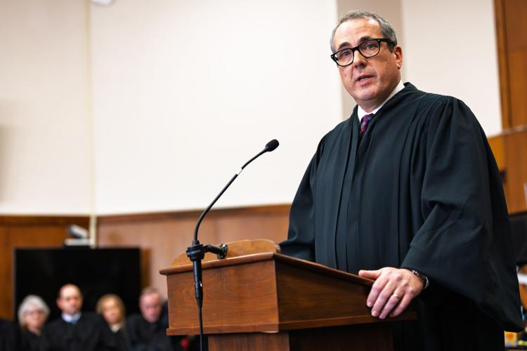 Photos: Chief Justice Bunn swears in Judge David D. Amsbary ...