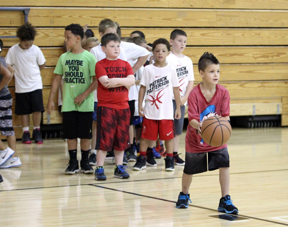 Kids learn from a pro at Patrick Patterson Camp | Youth Sports | herald ...